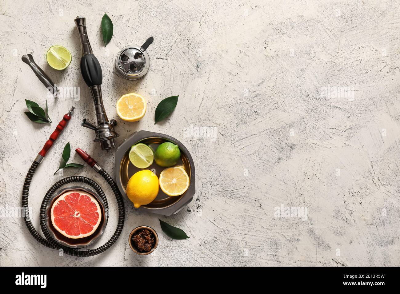 Parts of hookah and fruits on light background Stock Photo - Alamy