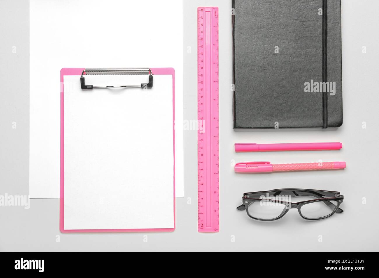 Composition with blank paper sheet and stationary on white background ...