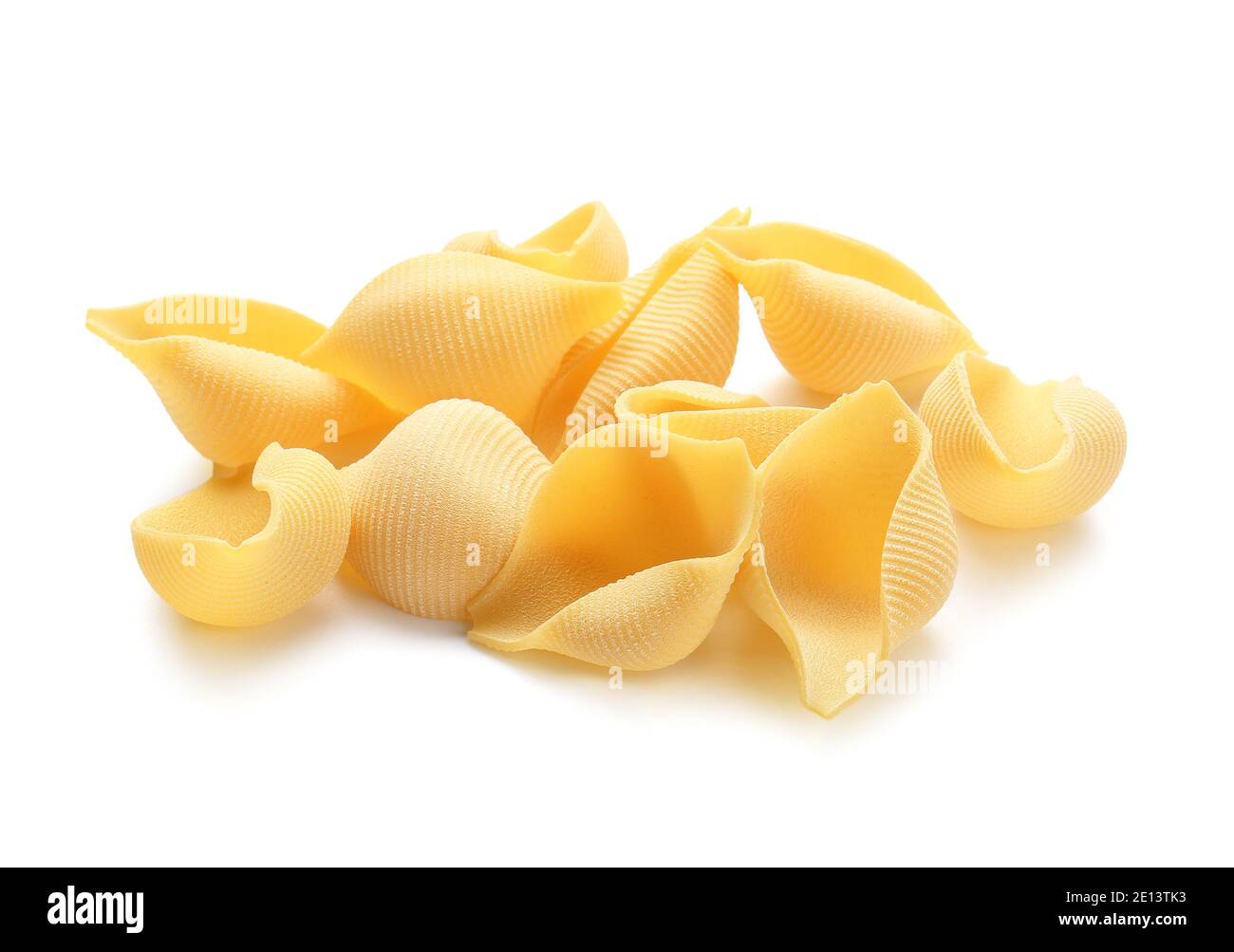 Uncooked pasta isolated on white background Stock Photo - Alamy