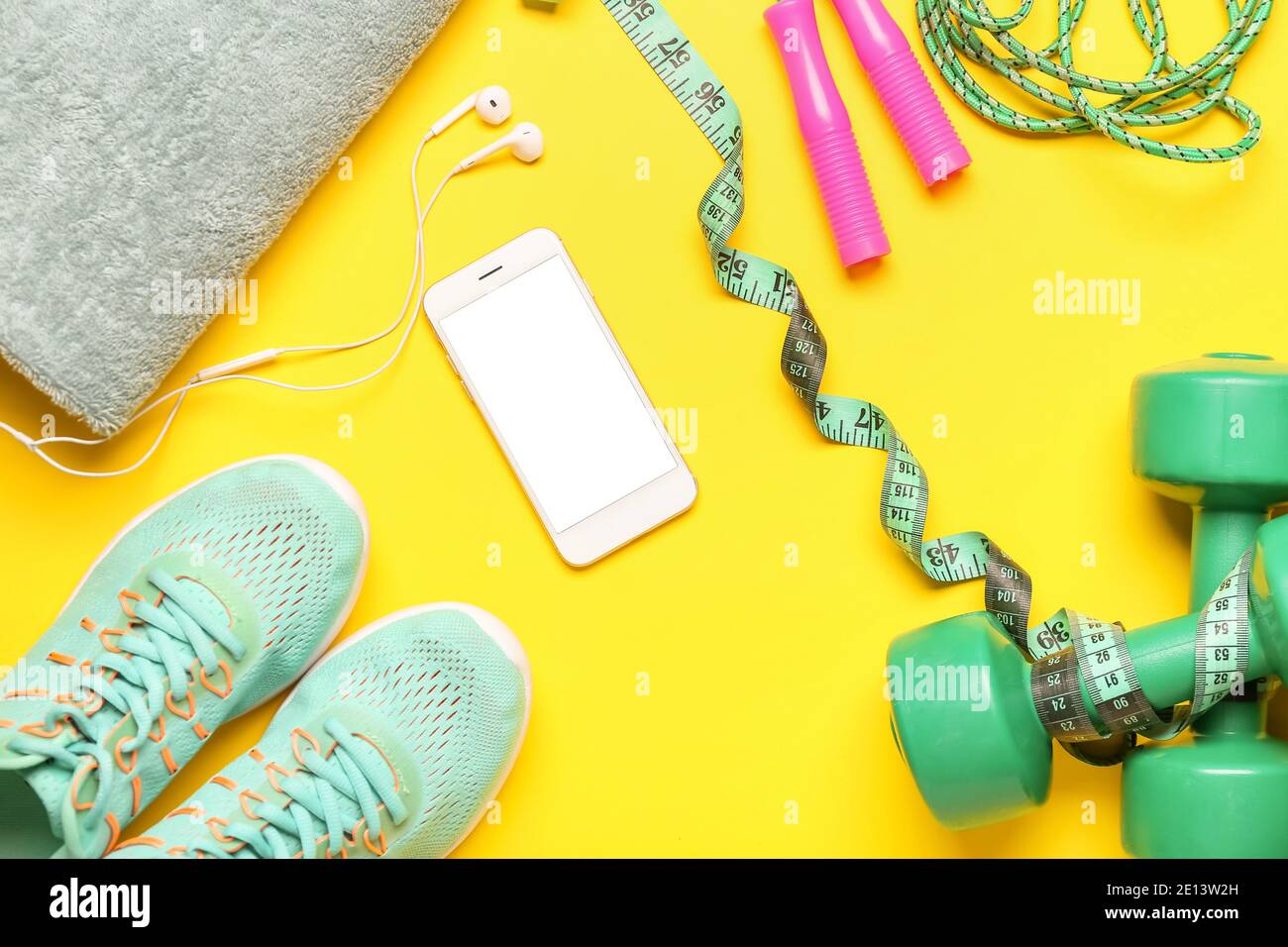 Set of sport equipment on color background Stock Photo - Alamy