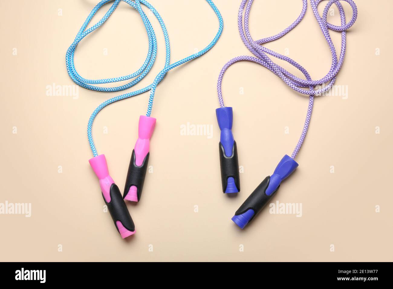 Jumping ropes on light background Stock Photo - Alamy
