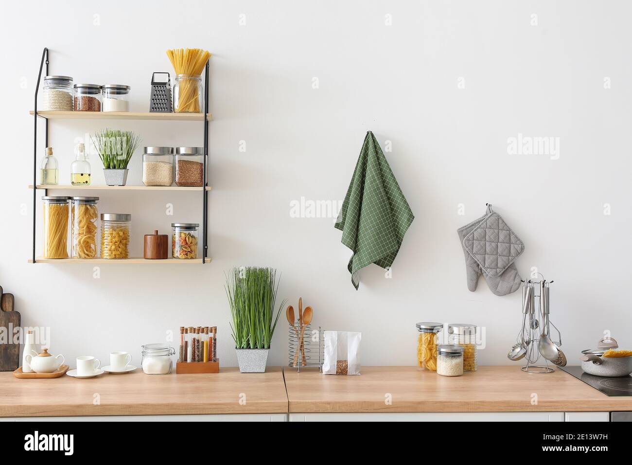 Utensils with products on counter in kitchen Stock Photo - Alamy