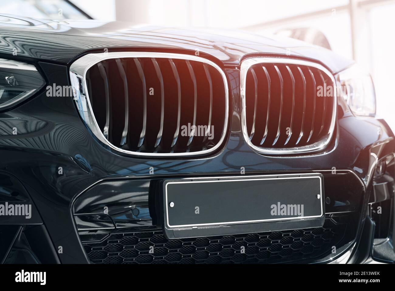 Radiator grille of a new luxury car Stock Photo - Alamy