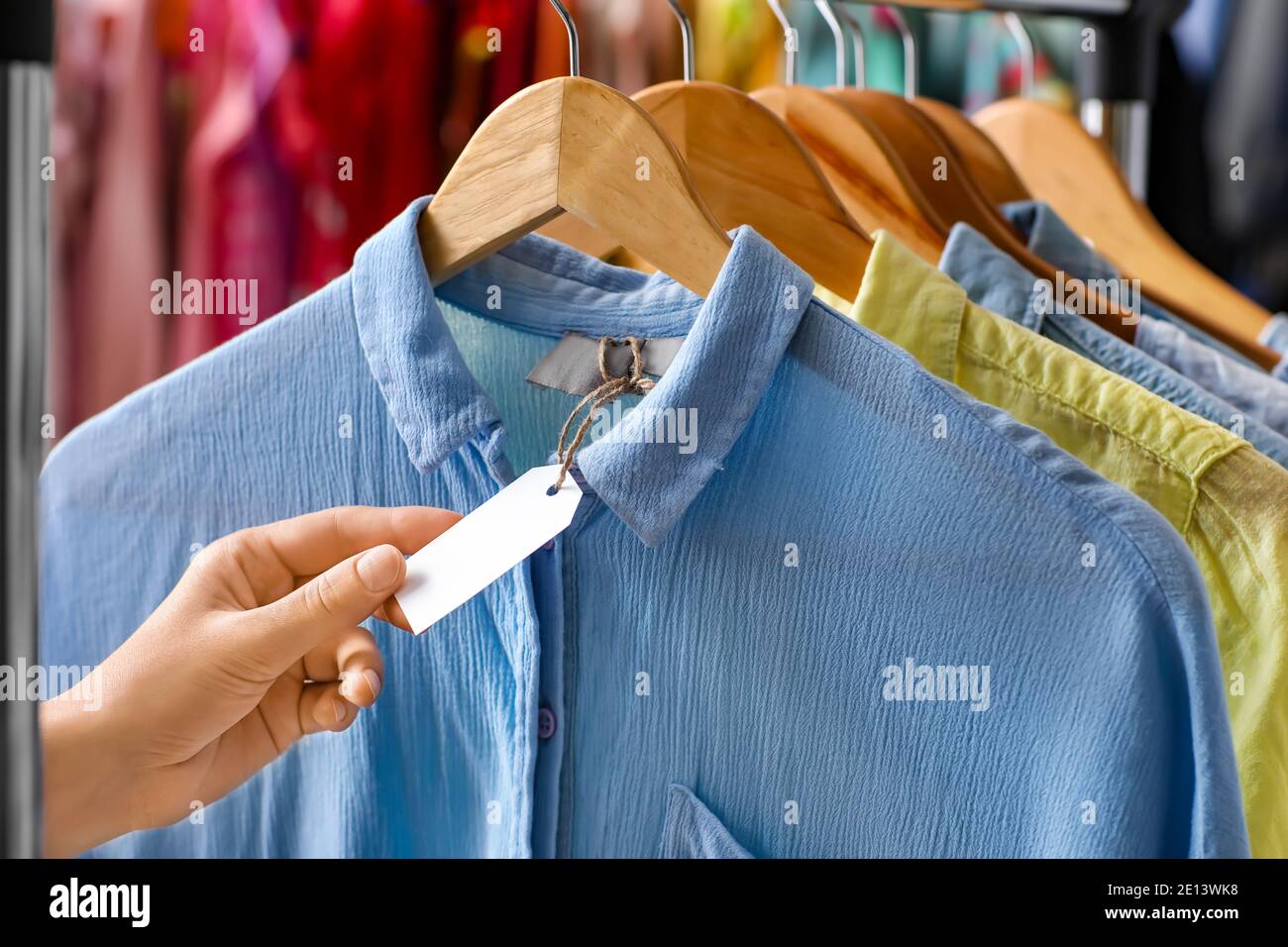 Hand and blank paper label on shirt hi-res stock photography and images ...