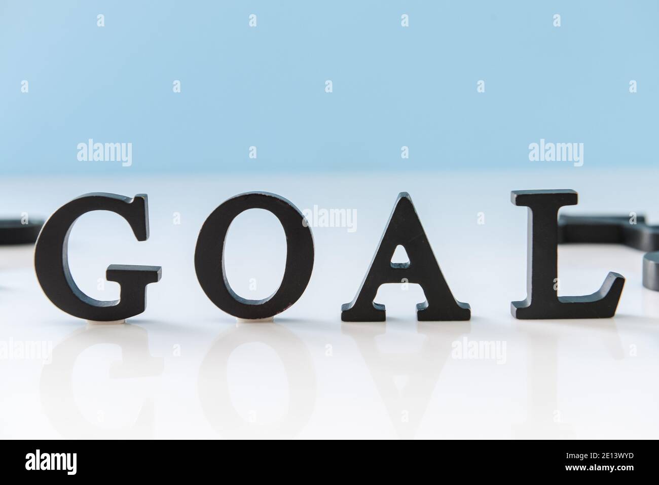 Composition with word GOAL on white background Stock Photo - Alamy