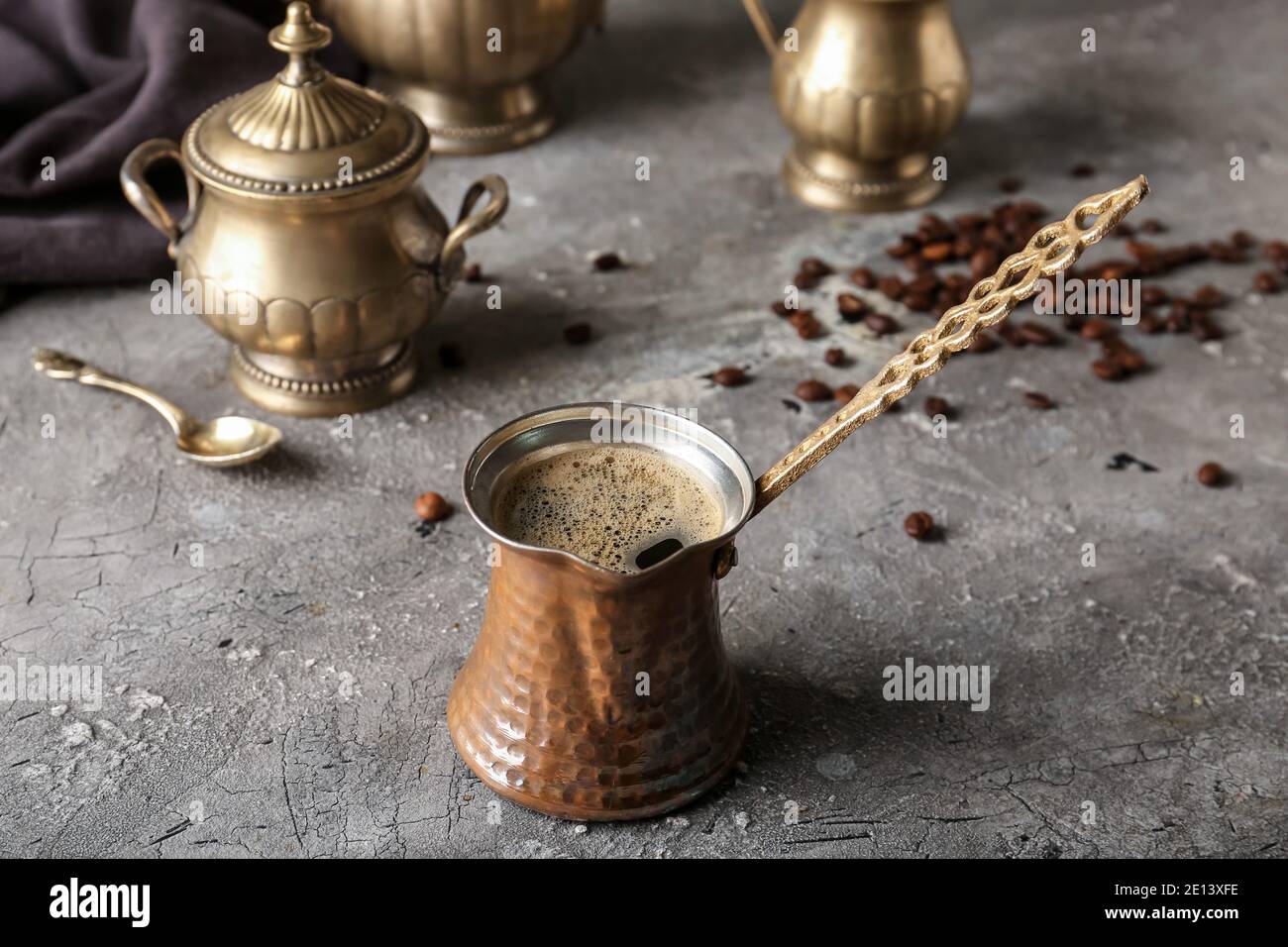 Turkish coffee in cezve on table Stock Photo - Alamy