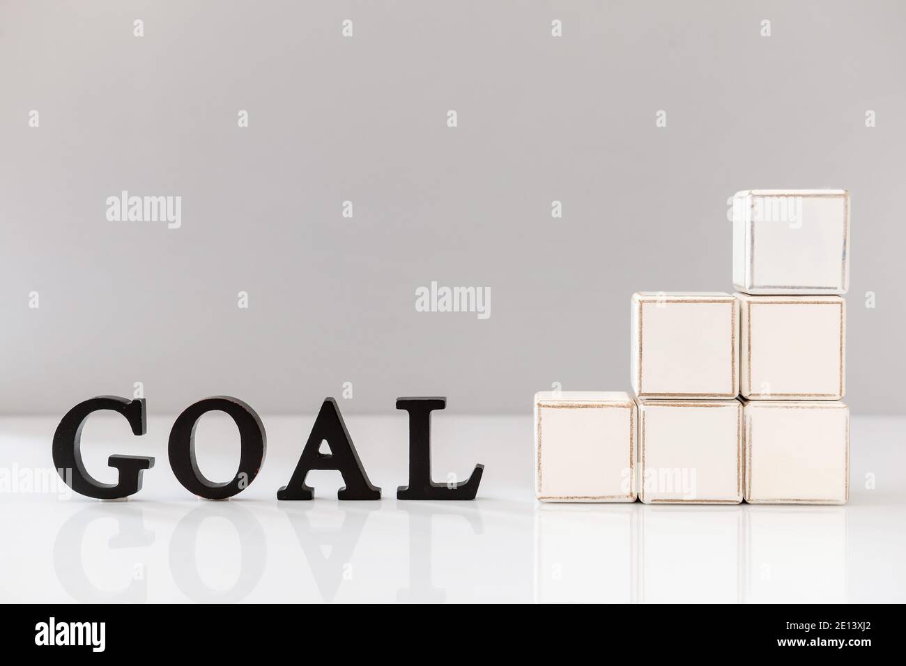 Composition with word GOAL on light background Stock Photo - Alamy