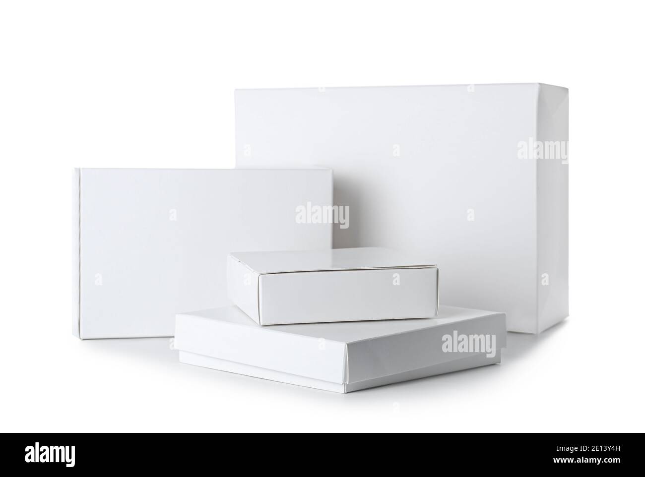 Blank cardboard boxes on white background Stock Photo - Alamy