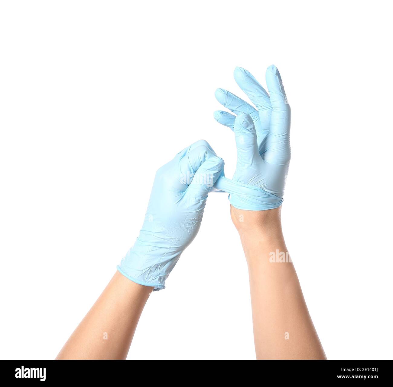 Woman taking off protective gloves on white background Stock Photo - Alamy