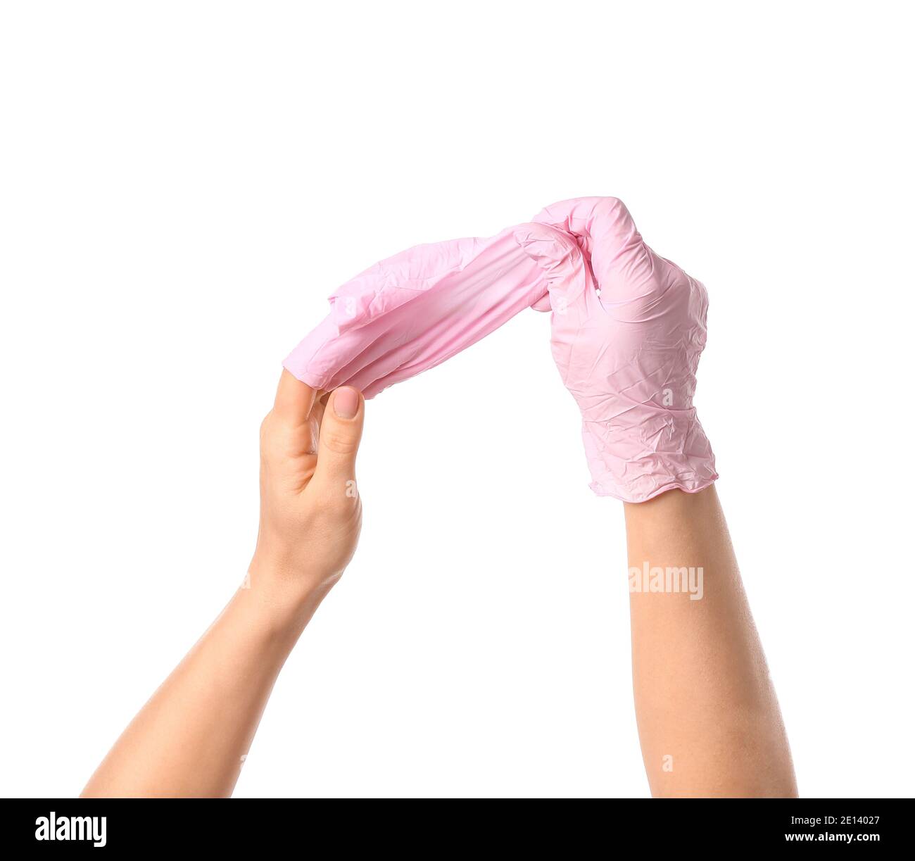 Woman taking off protective gloves on white background Stock Photo - Alamy