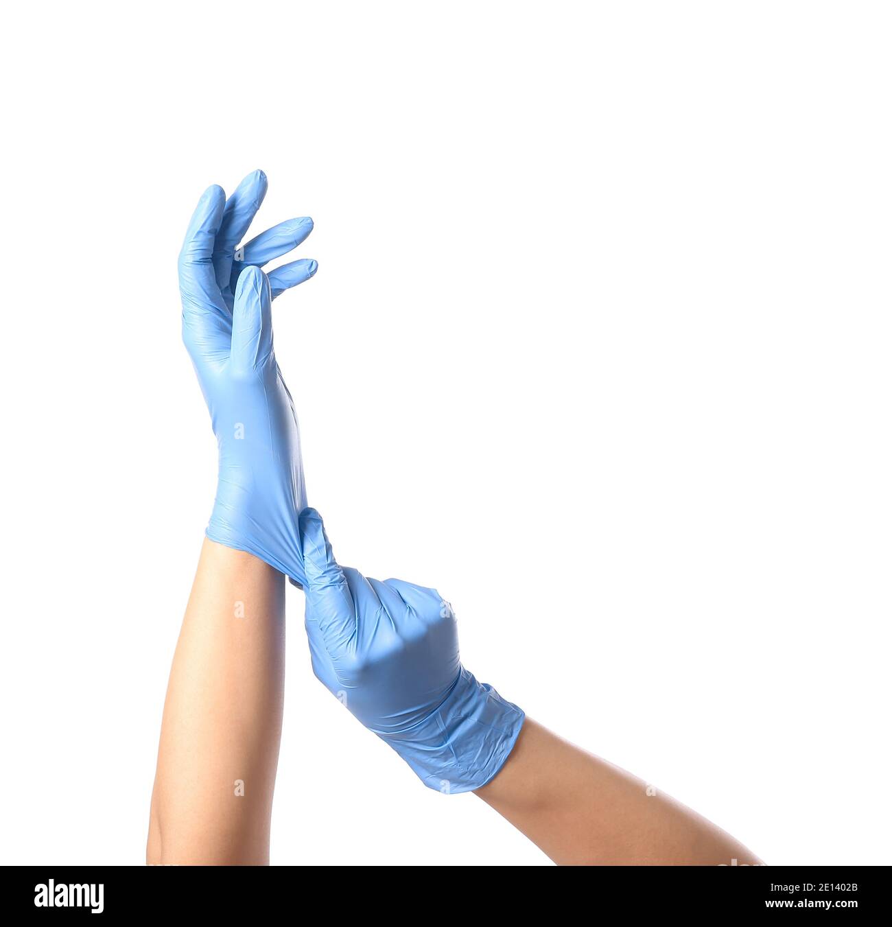 Woman taking off protective gloves on white background Stock Photo - Alamy