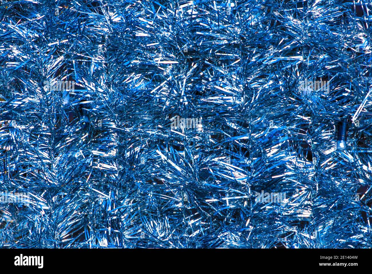 Blue garland of tinsel hi-res stock photography and images - Alamy