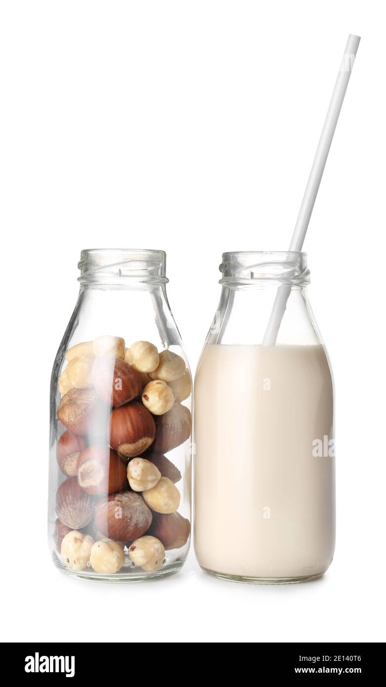 Bottles of hazelnut milk isolated on white background Stock Photo - Alamy