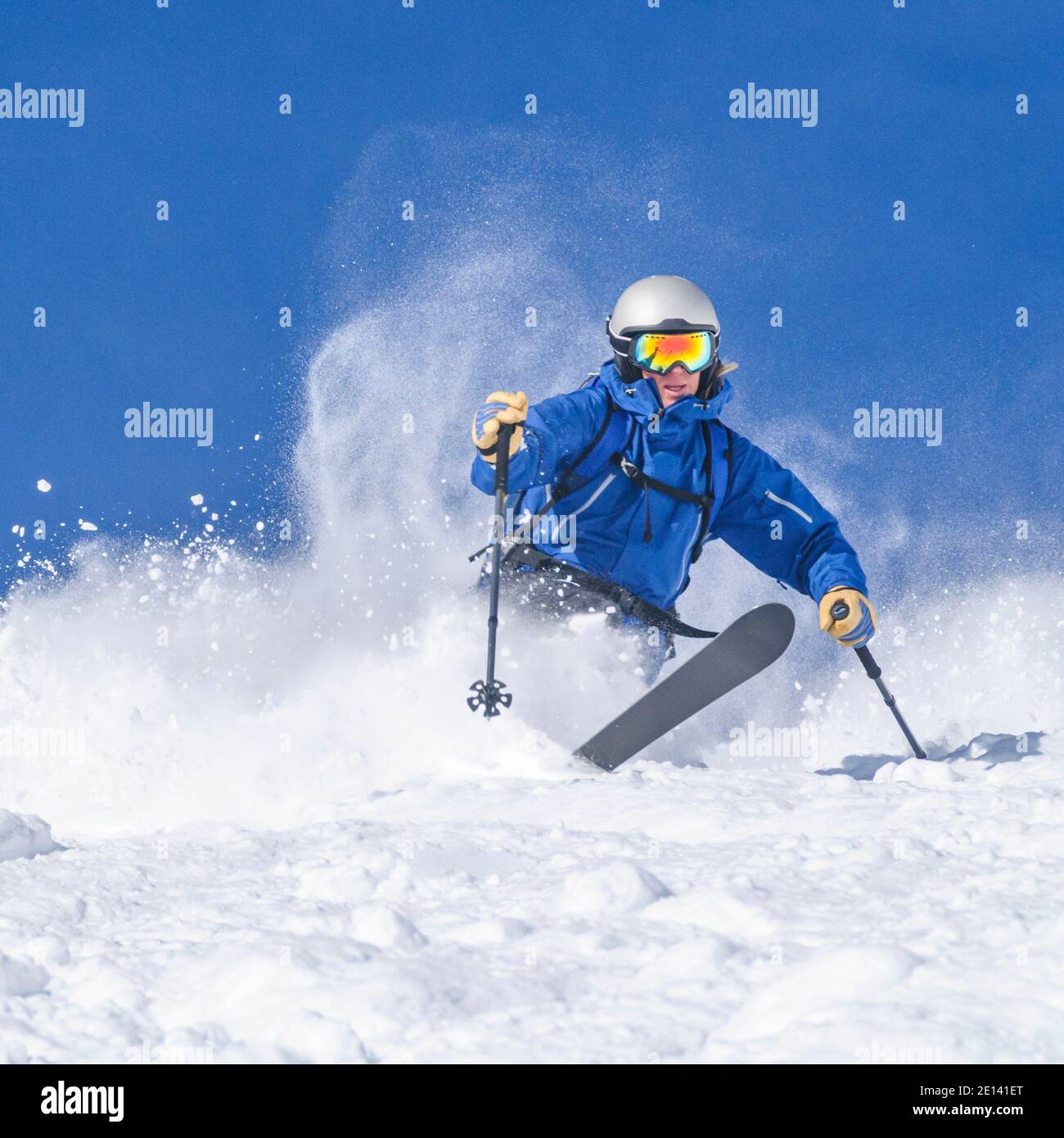 Telemark skier skiing on steep off-piste slope Stock Photo - Alamy