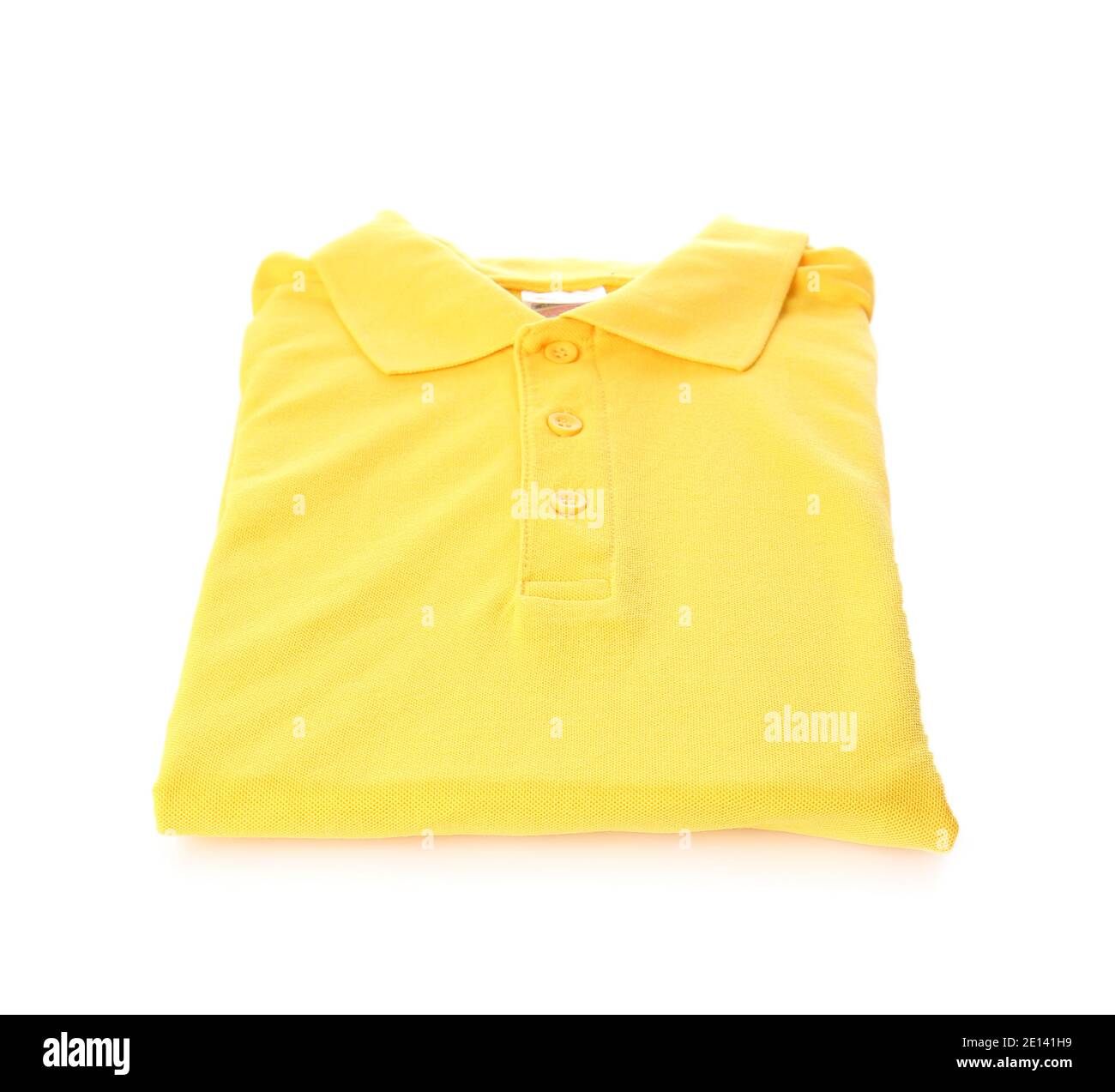 Folded polo shirt on white background Stock Photo - Alamy