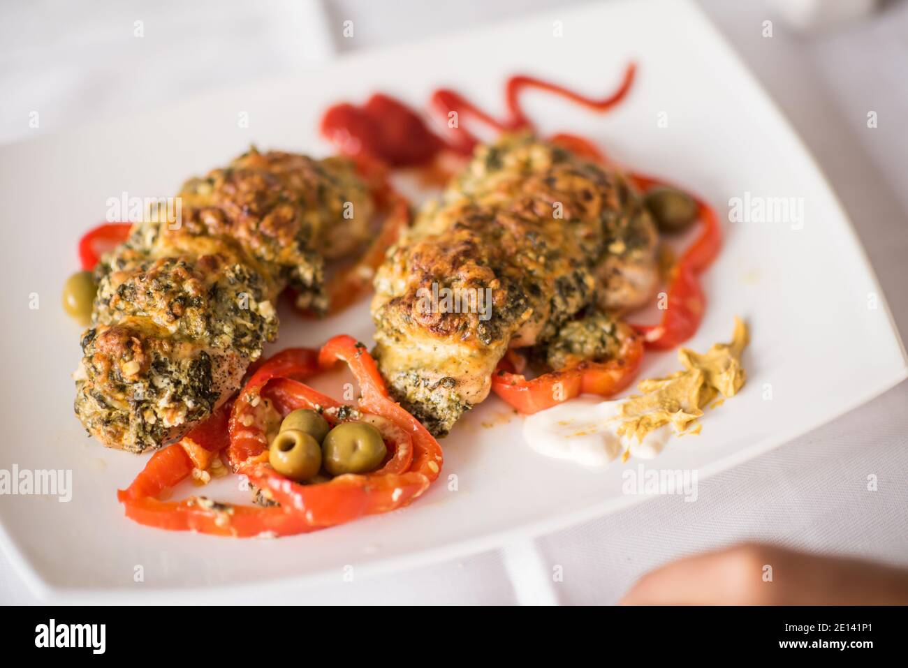 Beautiful ready lunch on dining table in modern home Stock Photo - Alamy