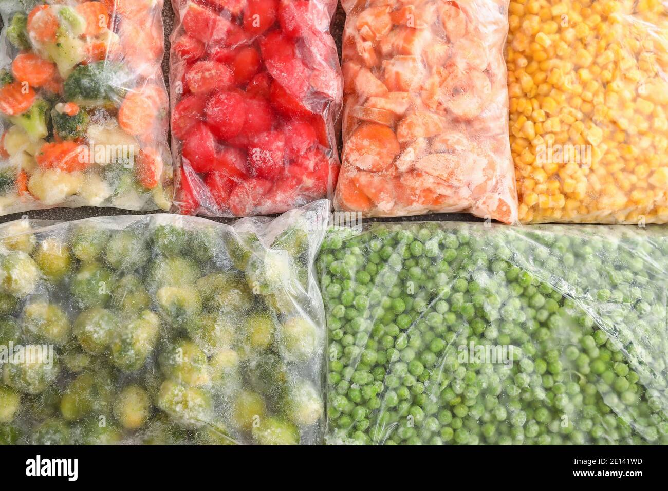 Plastic bags with different frozen vegetables, closeup Stock Photo - Alamy