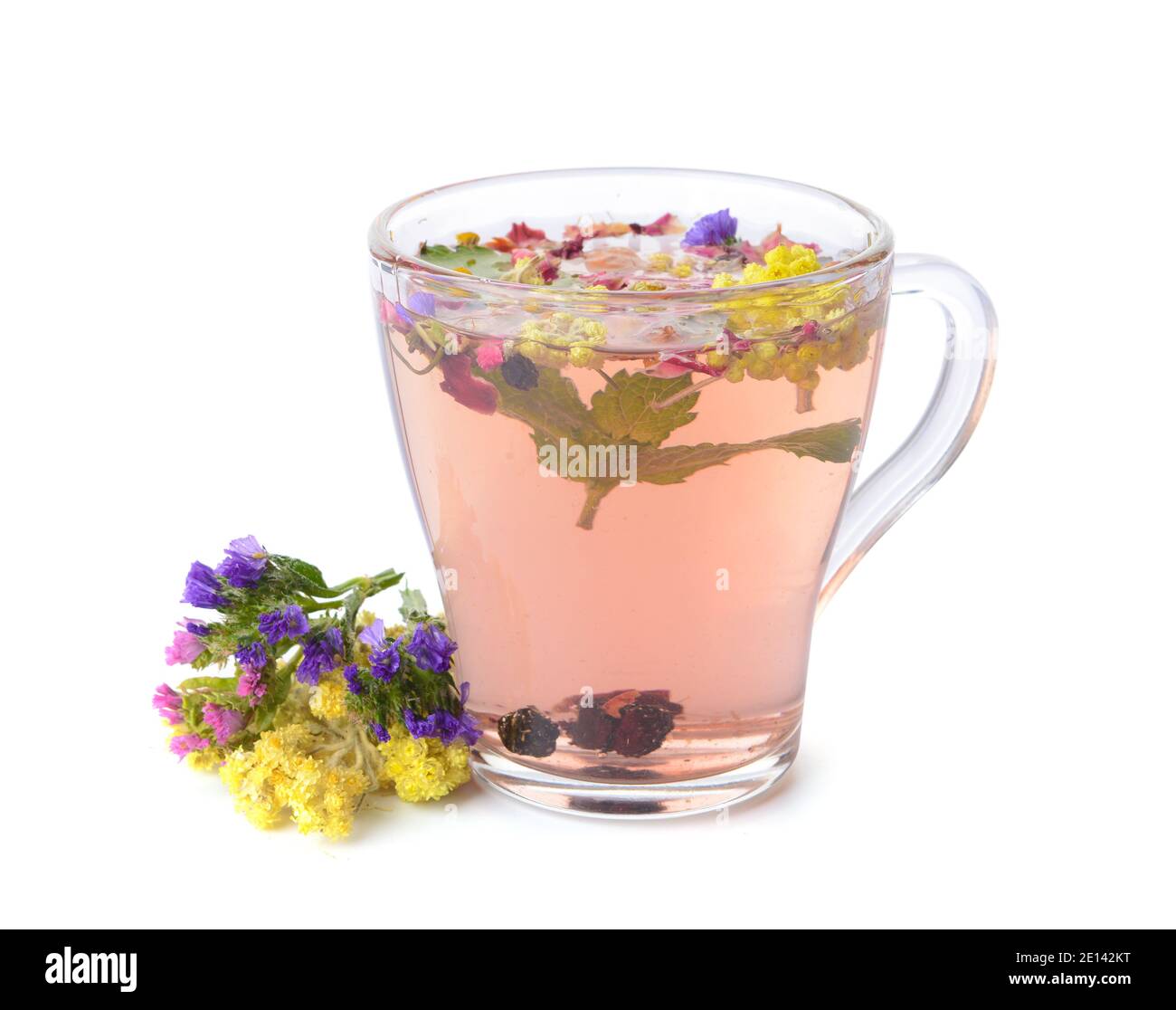 Cup of floral tea on white background Stock Photo - Alamy