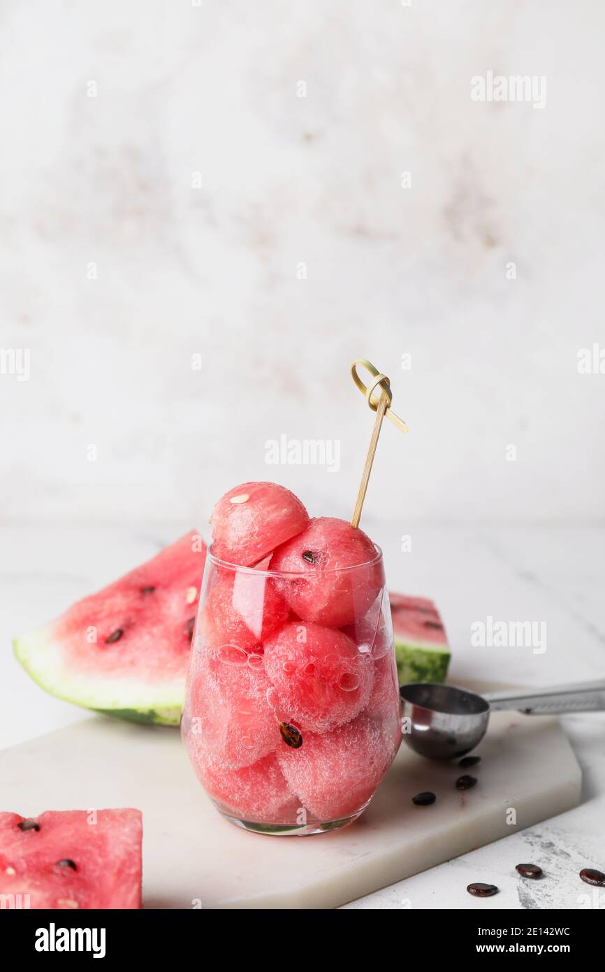 Tasty watermelon balls in glass on table Stock Photo - Alamy