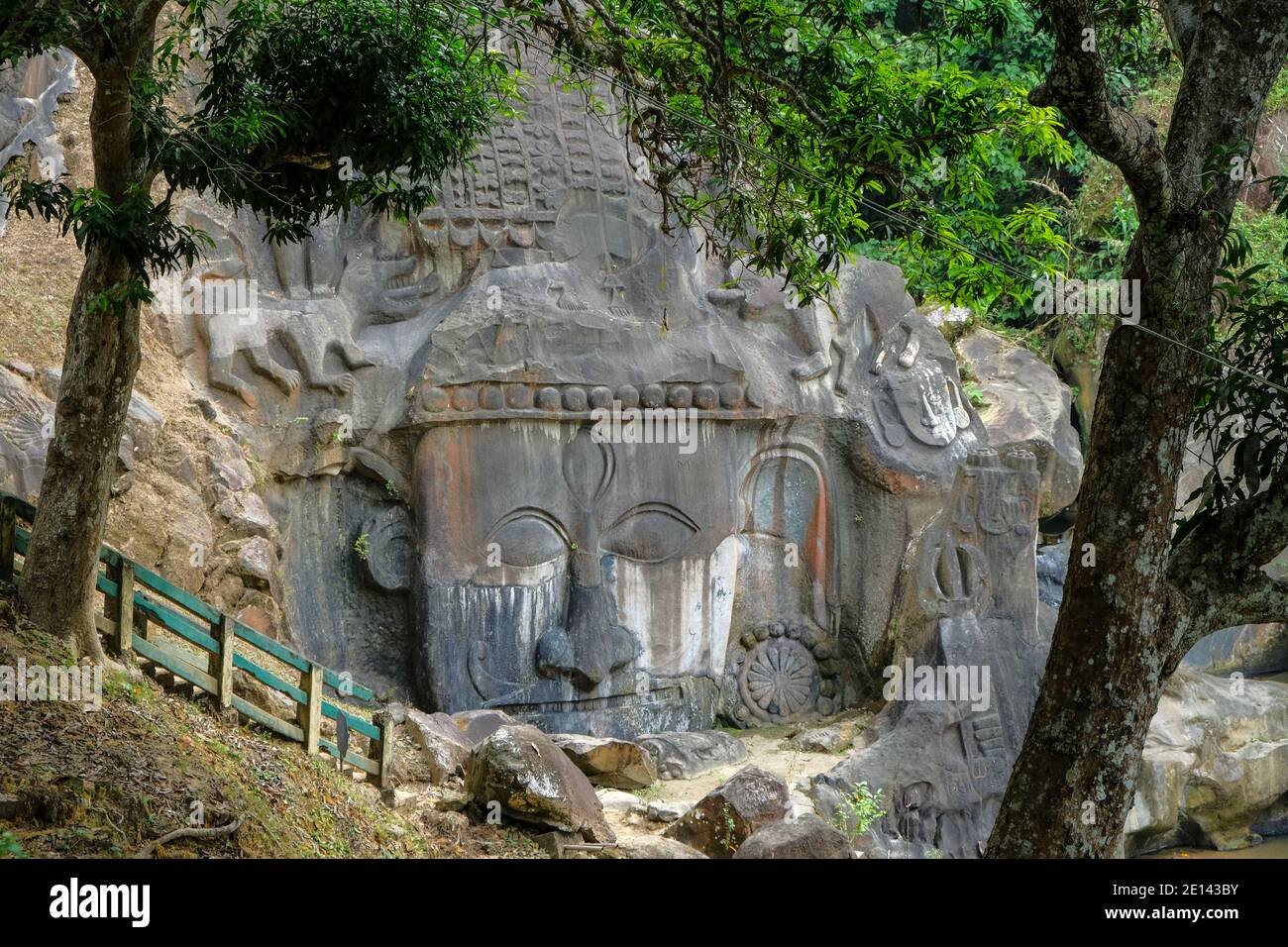 Sculptures carved into the rock at the archaeological site of Unakoti ...
