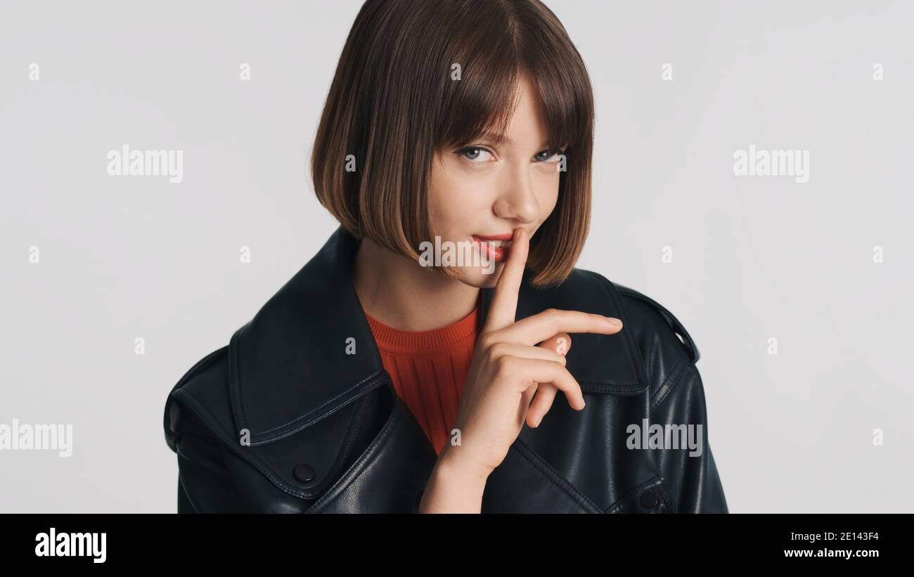 Beautiful casual brunette girl with bob hair has intriguing look asking ...