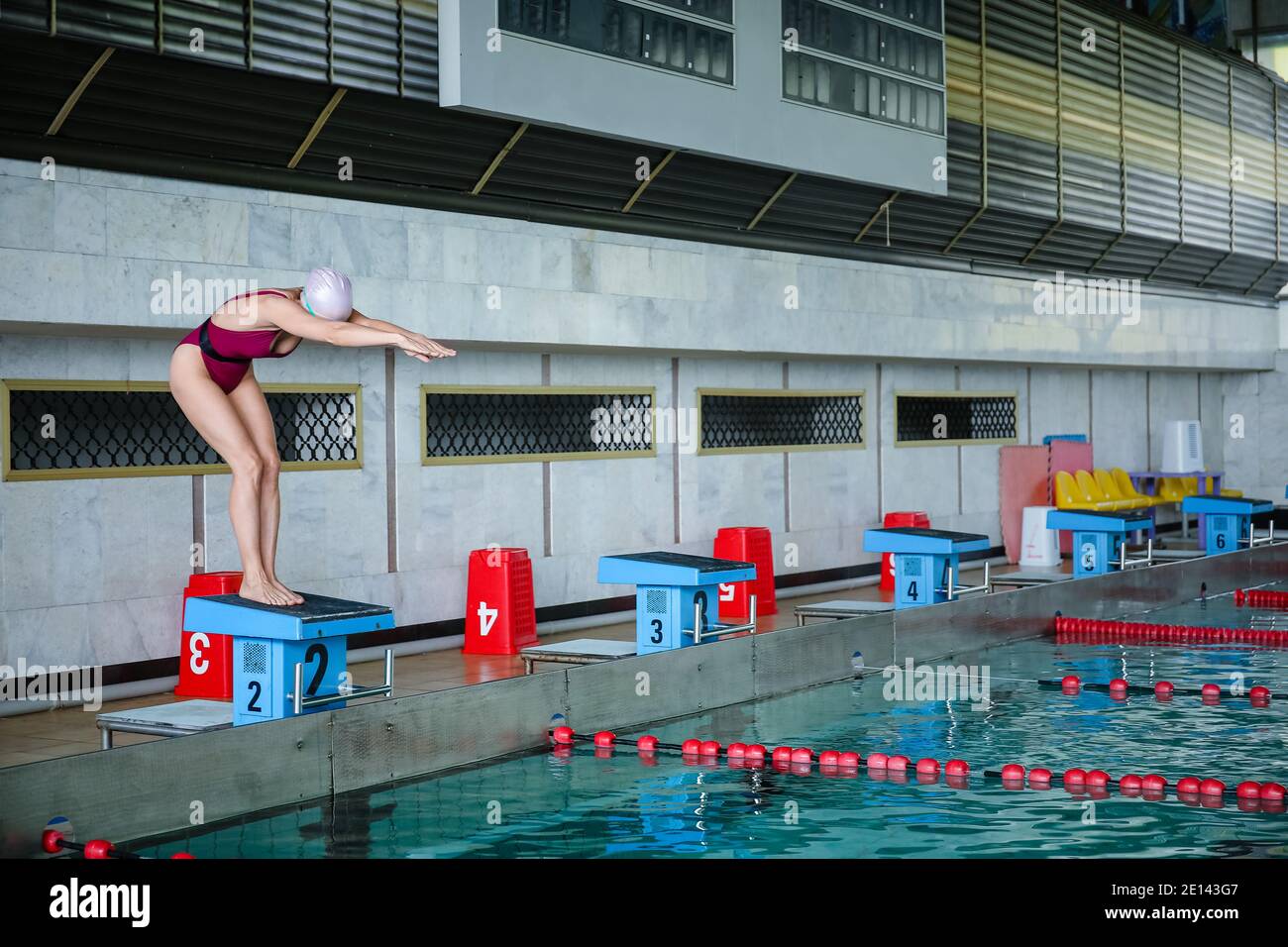 Sporty female swimmer in pool Stock Photo - Alamy