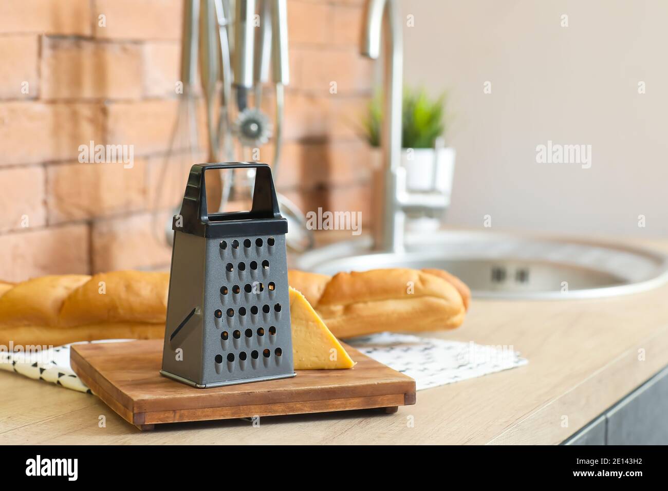 Grating bread hi-res stock photography and images - Alamy