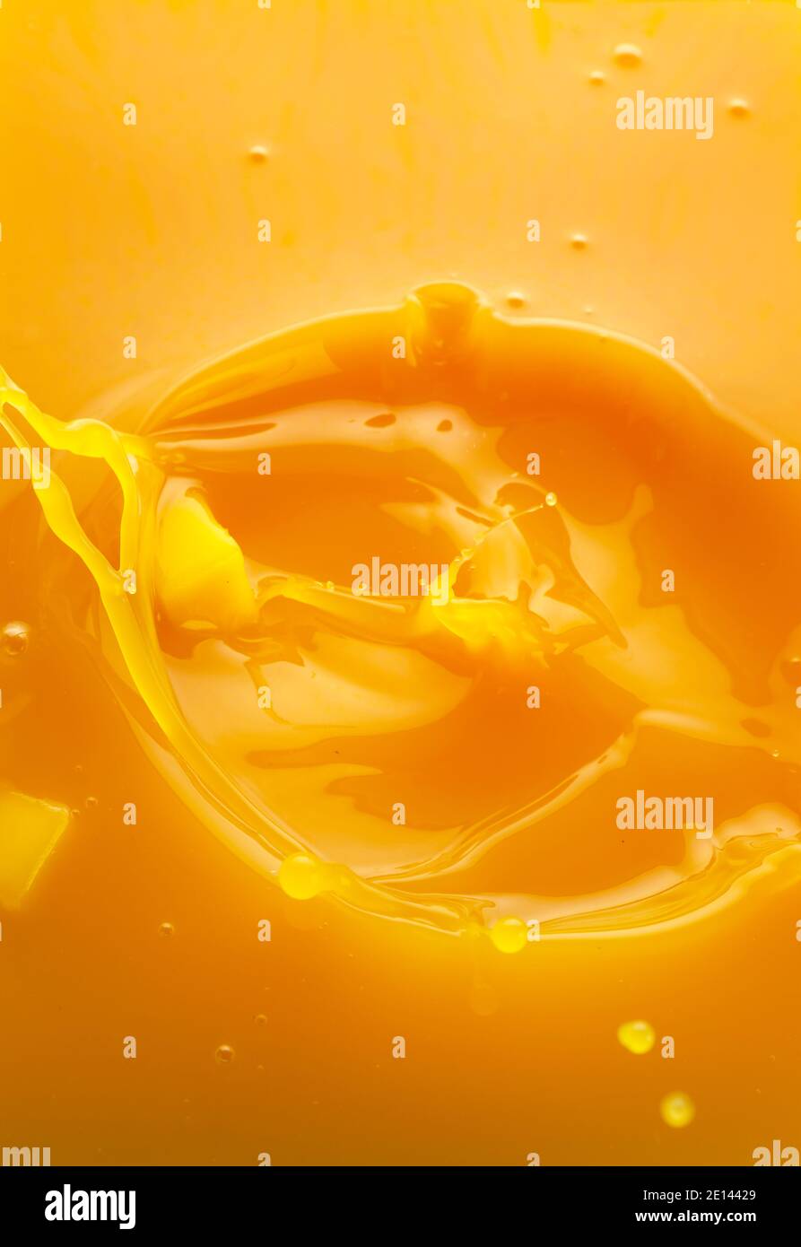 Falling mango cubes juice hi-res stock photography and images - Alamy