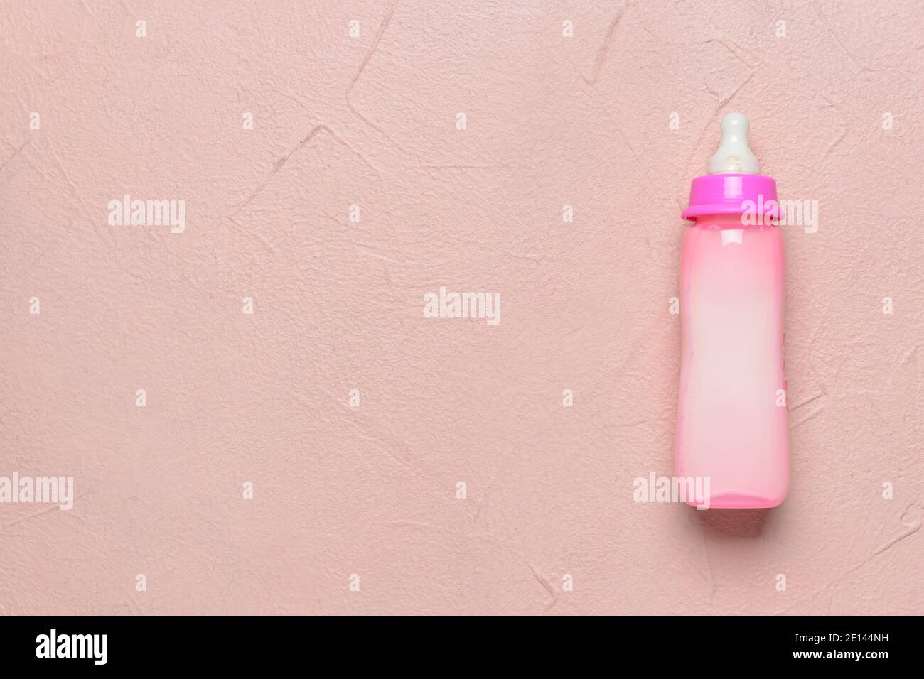 Bottle of milk for baby on color background Stock Photo - Alamy