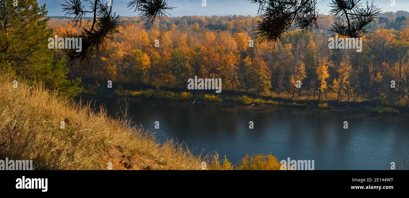 Beautiful panorama of the autumn forest, across the river on the ...