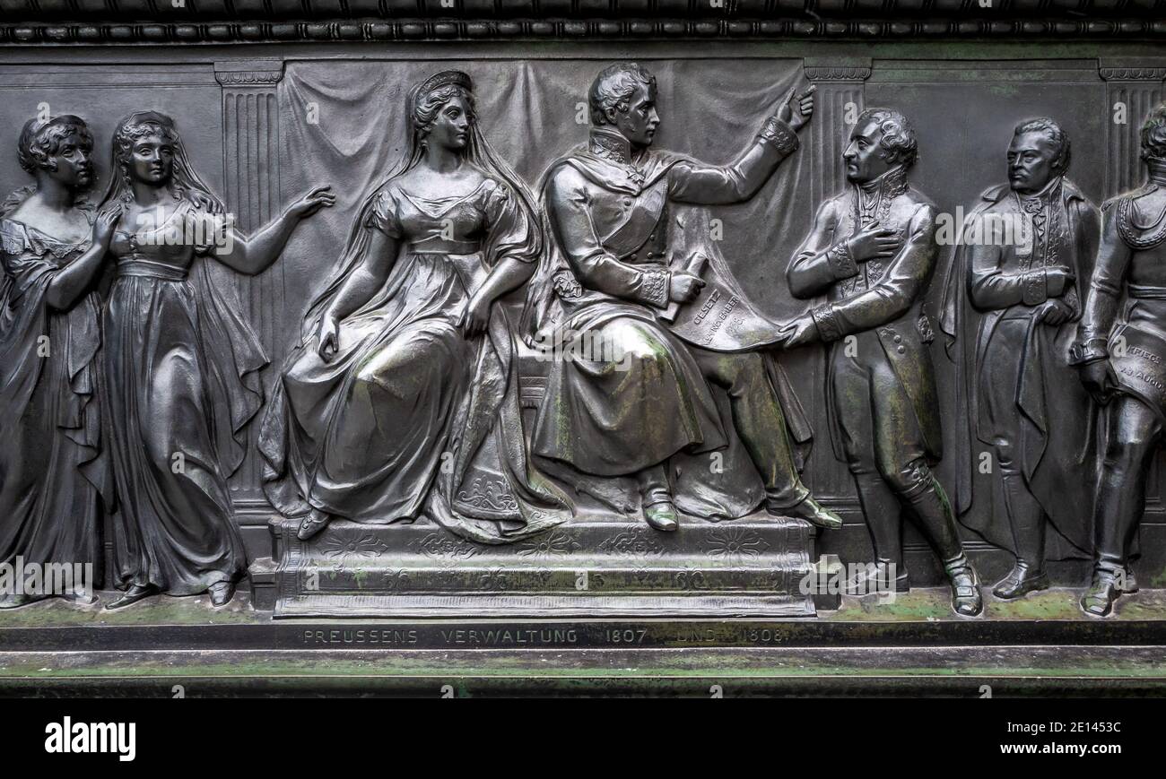 Bronze Sculptures On The Pedestal Of A Monument In Front Of The House ...
