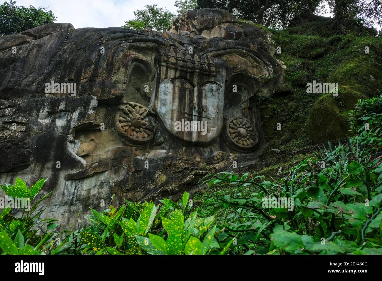 Sculptures carved into the rock at the archaeological site of Unakoti ...