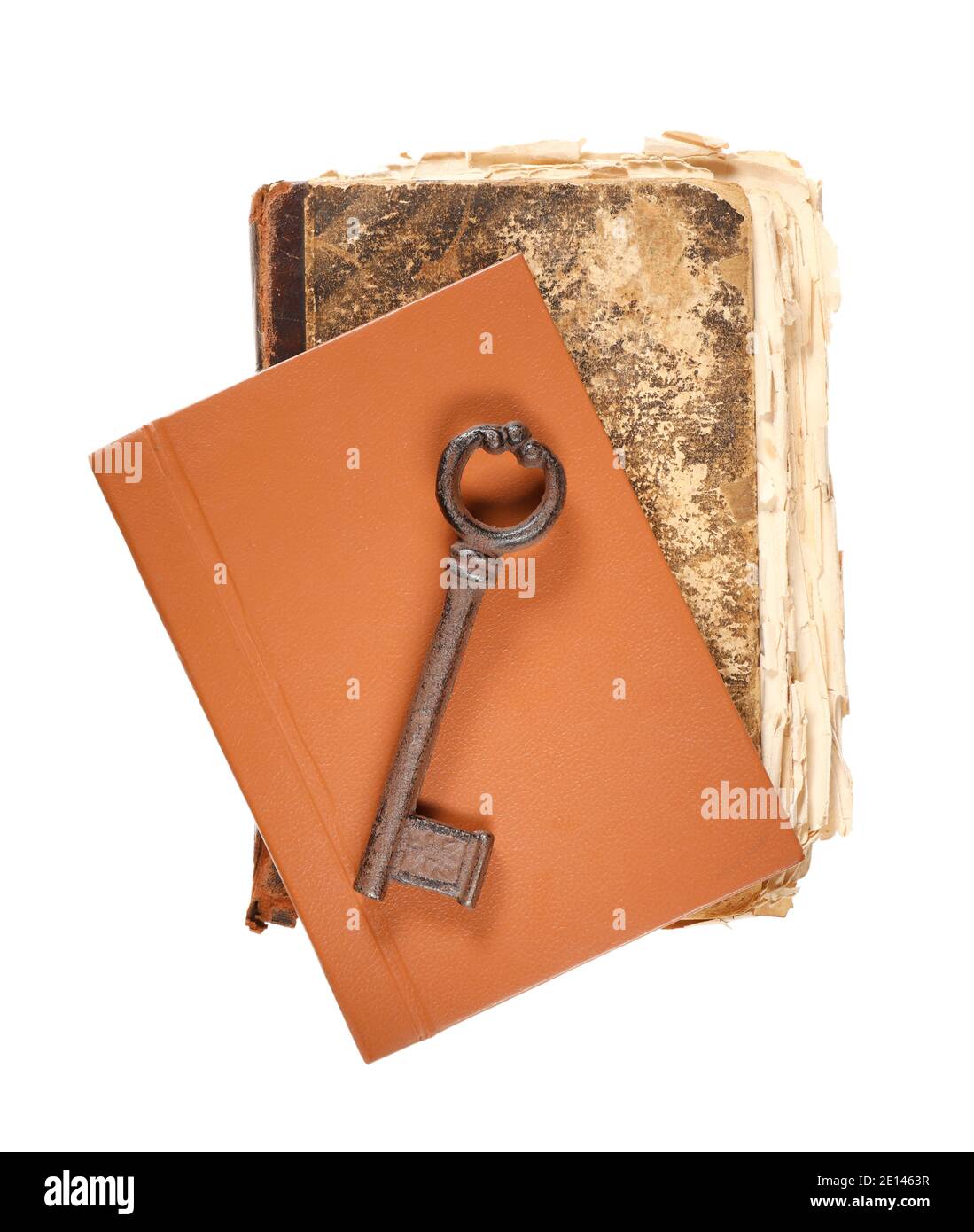 Old books with key on white background Stock Photo - Alamy