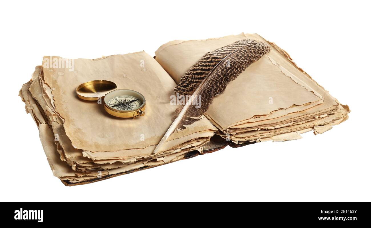 Old book with compass and feather on white background Stock Photo - Alamy