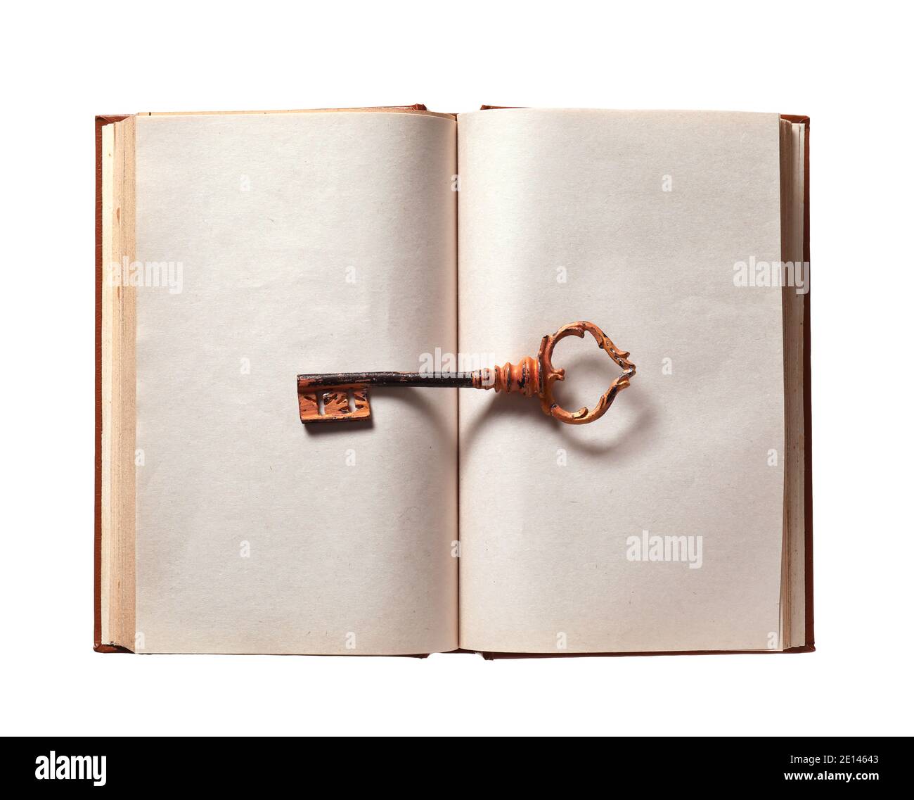 Old book with key on white background Stock Photo - Alamy