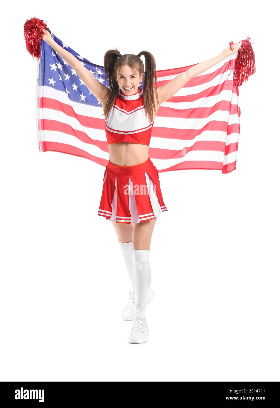 Beautiful young cheerleader with USA flag on white background Stock ...