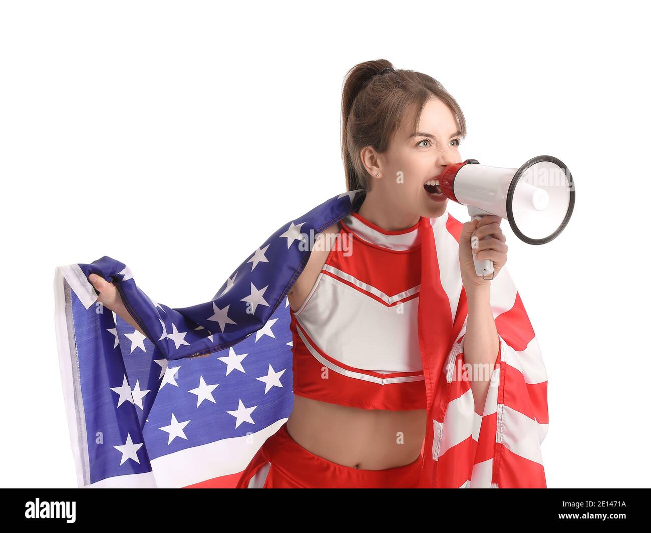Beautiful young cheerleader with USA flag and megaphone on white ...