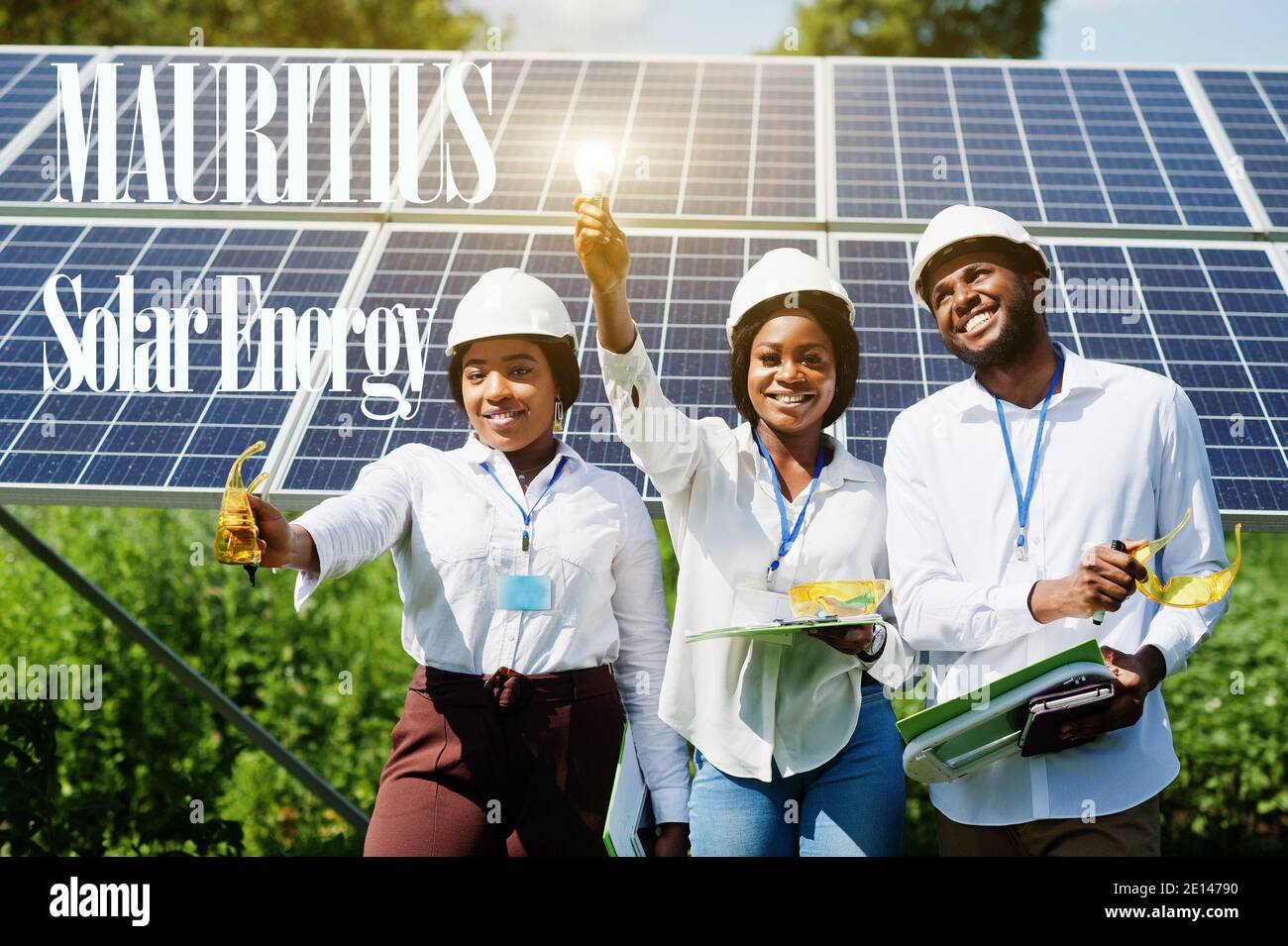 Mauritius solar energy. African engineers at panels station Stock Photo ...