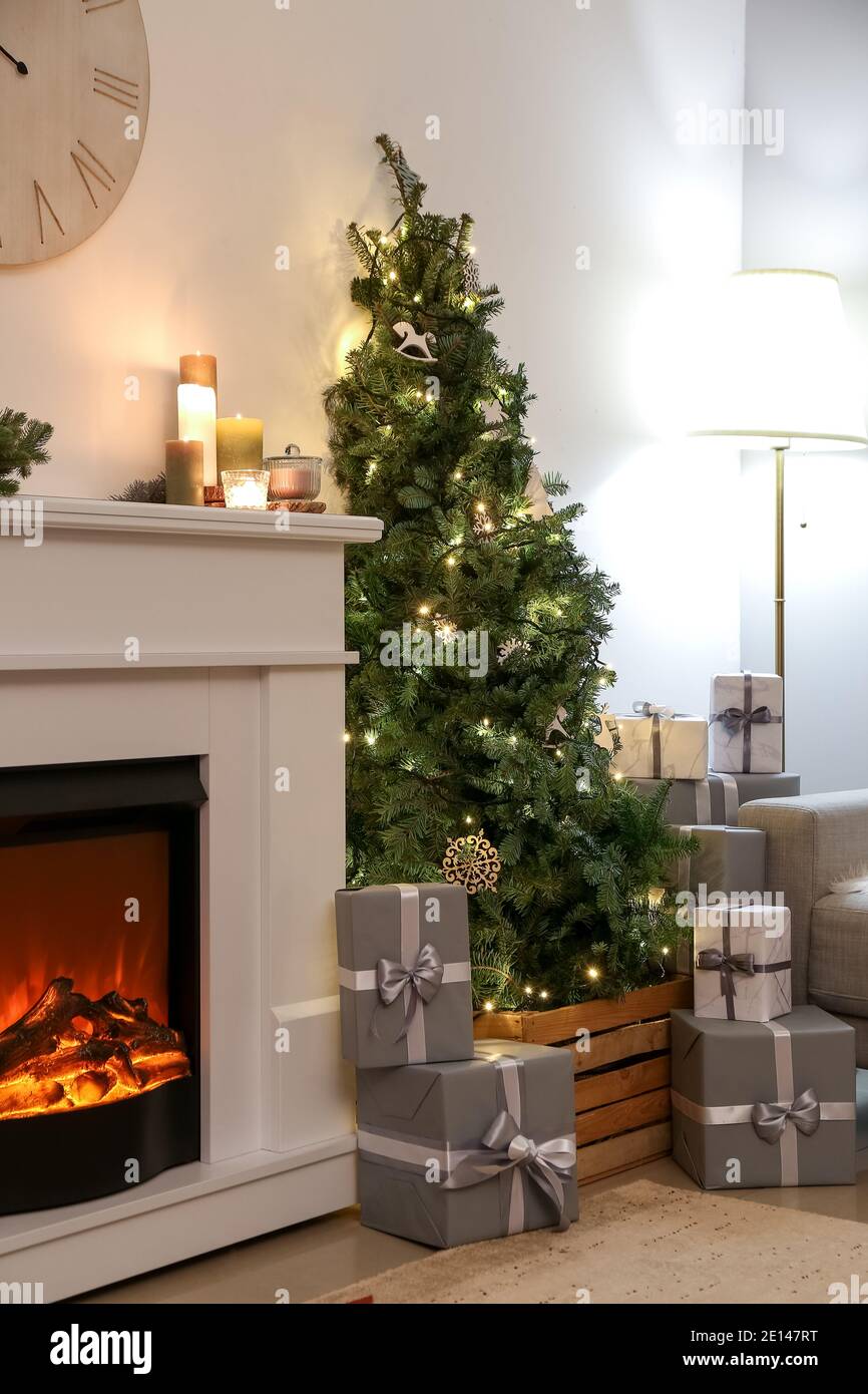 Interior of living room with beautiful Christmas tree Stock Photo - Alamy