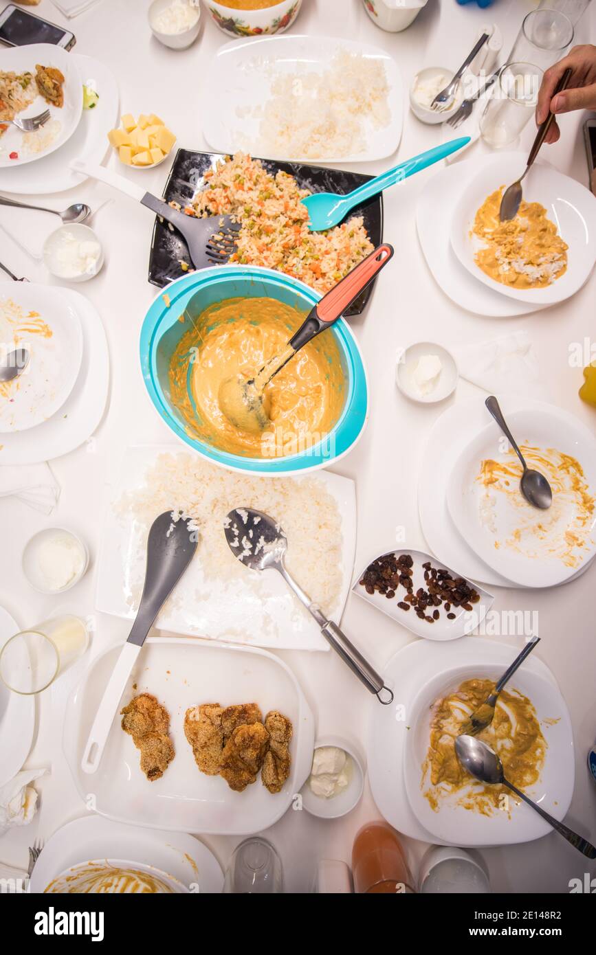 Beautiful ready lunch on dining table in modern home Stock Photo - Alamy