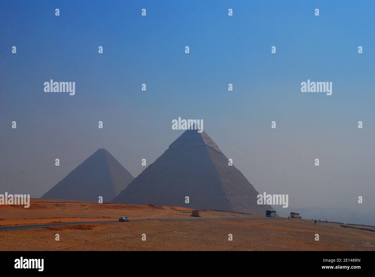 Giza pyramids and blue sky in desert in egypt Stock Photo - Alamy