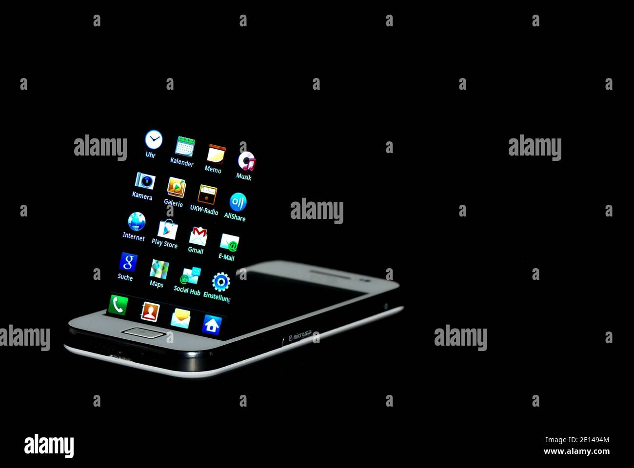 mobile phone with expanded desktop on black background Stock Photo - Alamy