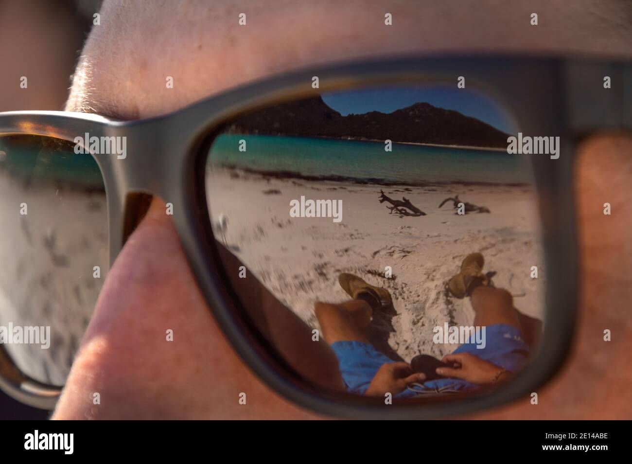 Clear reflection of a remote beach in Tasmania Stock Photo - Alamy