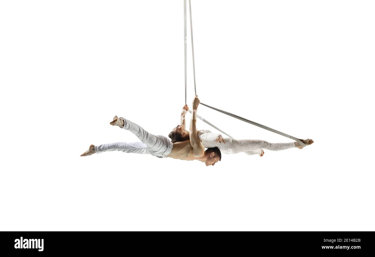 Freedom Couple Of Young Acrobats Circus Athletes Isolated On White