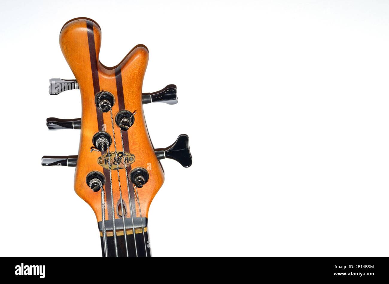 head of a bass guitar on white background Stock Photo - Alamy