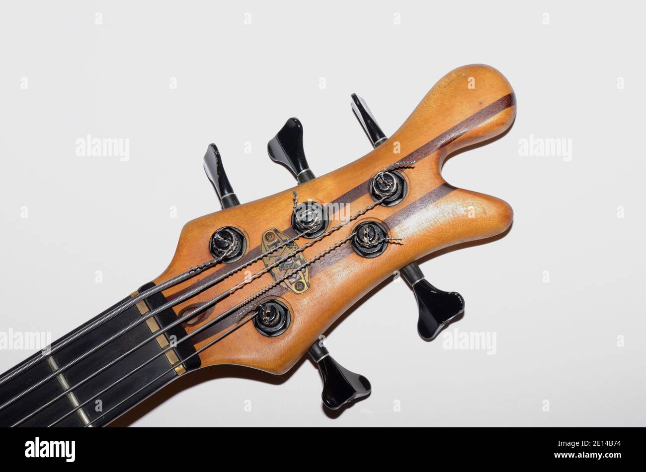 head of bass guitar on white background below Stock Photo - Alamy
