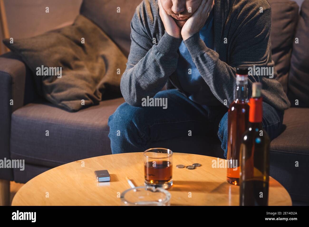 Drunk man sitting table alcohol hi-res stock photography and images - Alamy