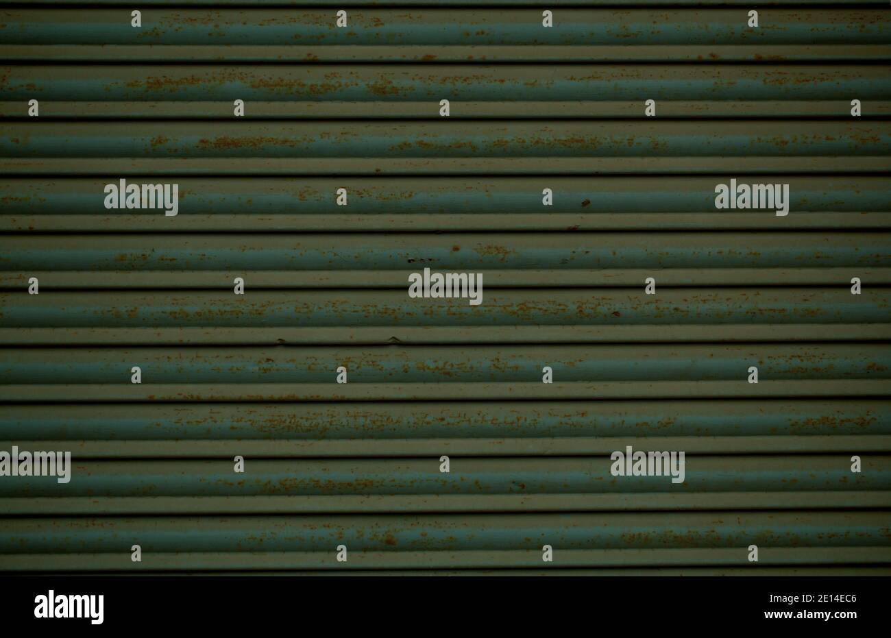 Old rusting metal security shutters texture Stock Photo - Alamy