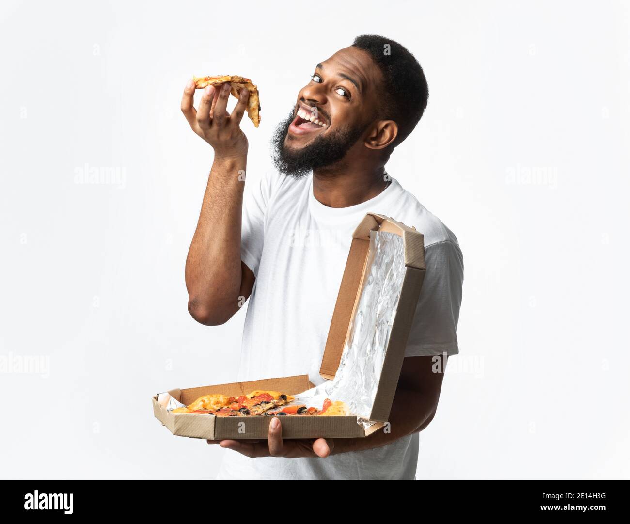 Fastfood man pizza slice junk food hi-res stock photography and images ...