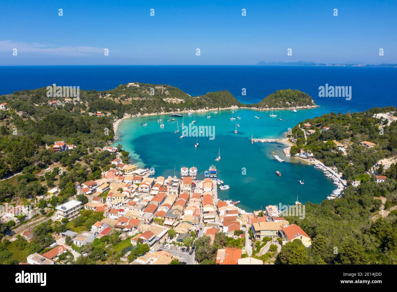 Aerial coastal view of the village of Lakka on the north coast of Paxos, Ionian Islands, Greece ...